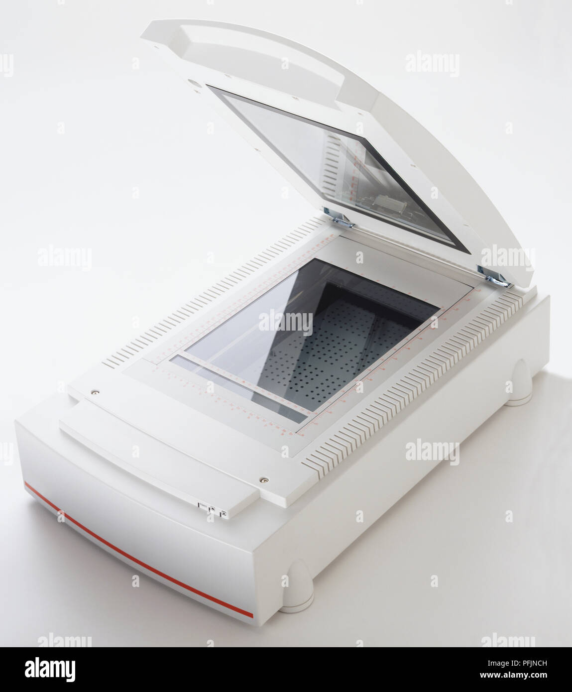 Scanner with lid lifted to reveal glass scanning surface, high angle ...