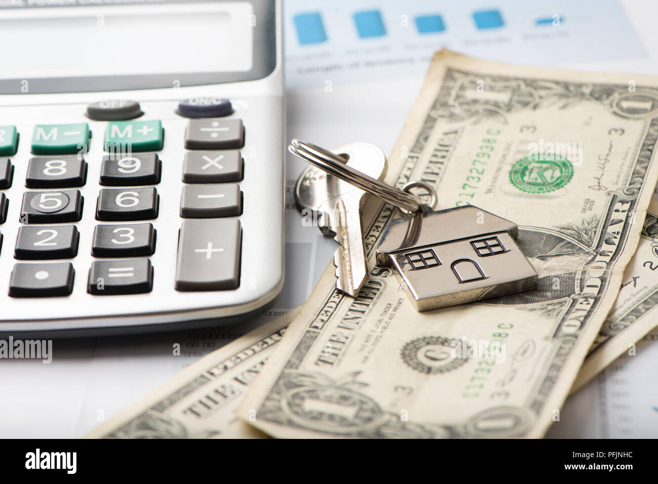 House key on dollar Banknotes Stock Photo - Alamy