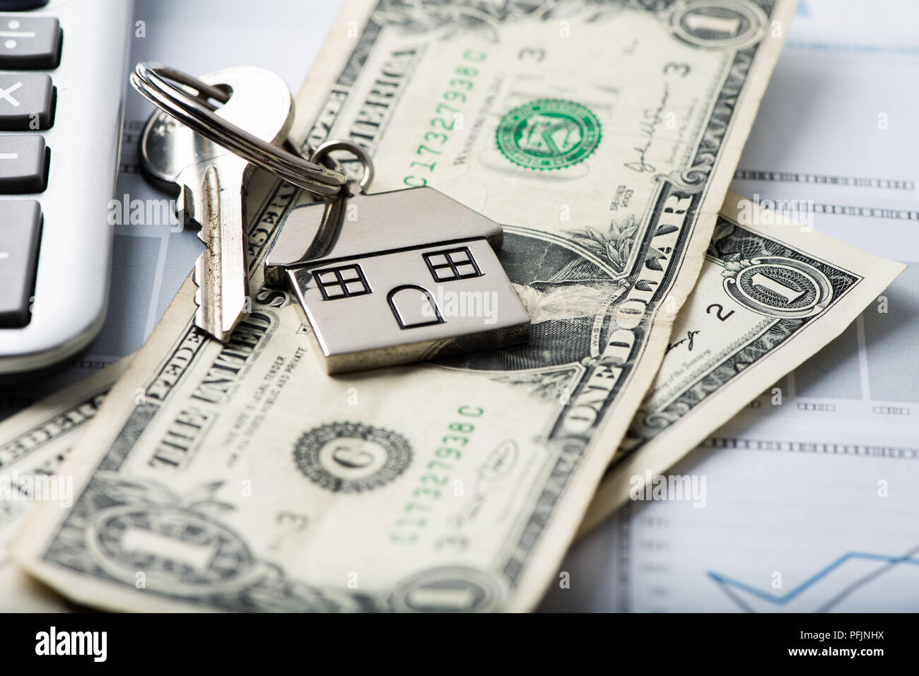 House key on dollar Banknotes Stock Photo - Alamy