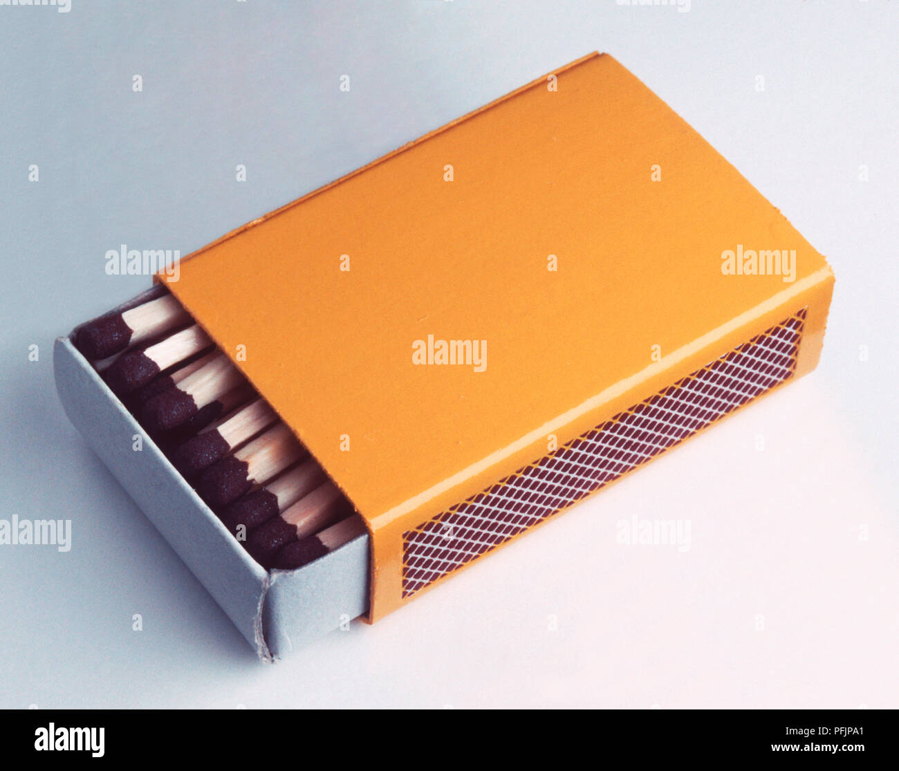 Matchbox open containing matches Stock Photo - Alamy