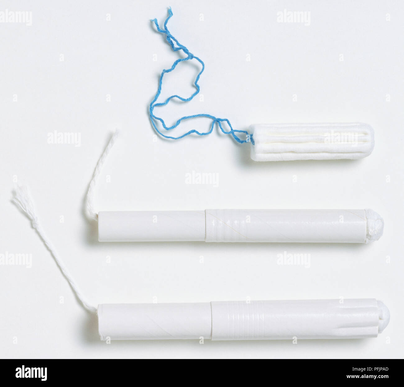 Three tampons, with and without applicators Stock Photo - Alamy