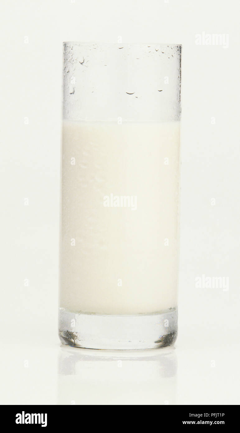 Glass of milk, front view Stock Photo - Alamy