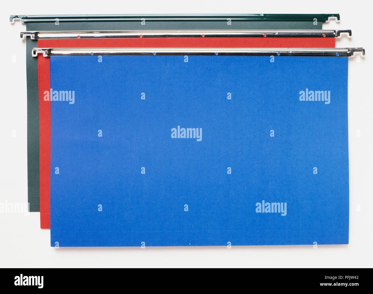 Three paper hanging files, close up Stock Photo - Alamy