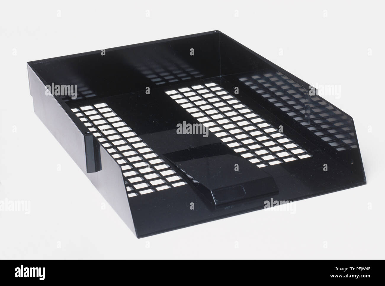 Black plastic paper tray, close up Stock Photo - Alamy