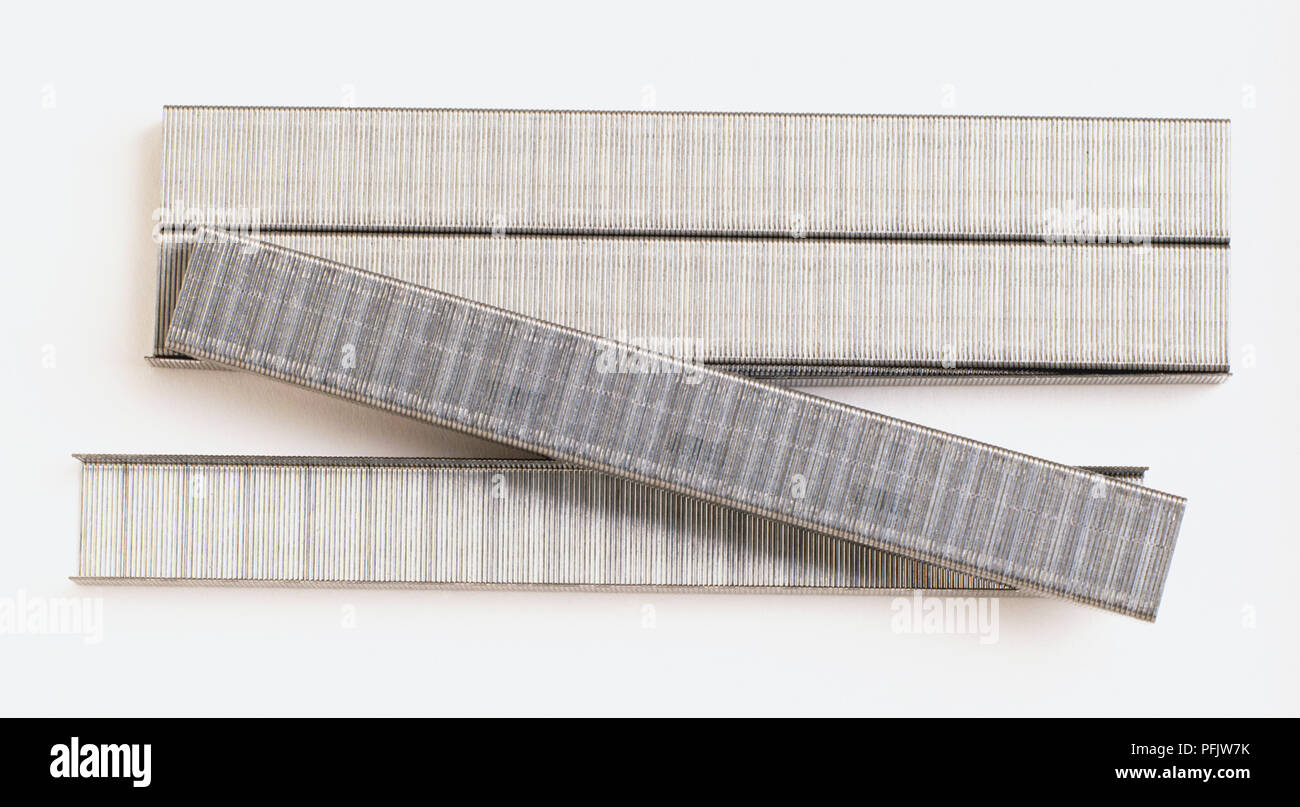 Four strips of paper staples, close up Stock Photo - Alamy