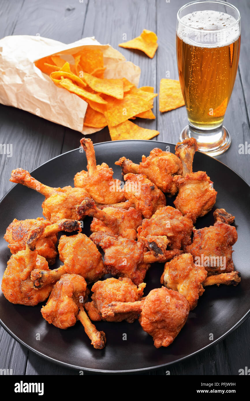 delicious deep fried battered crispy chicken winglets with exposed ...