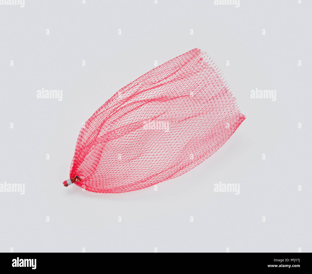 Red plastic net bag Stock Photo - Alamy