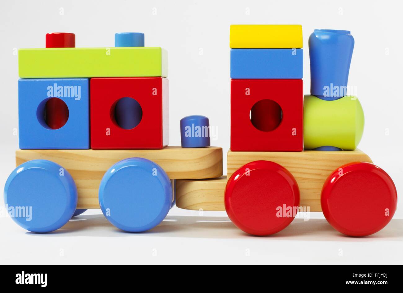 Wooden toy train, side view Stock Photo - Alamy