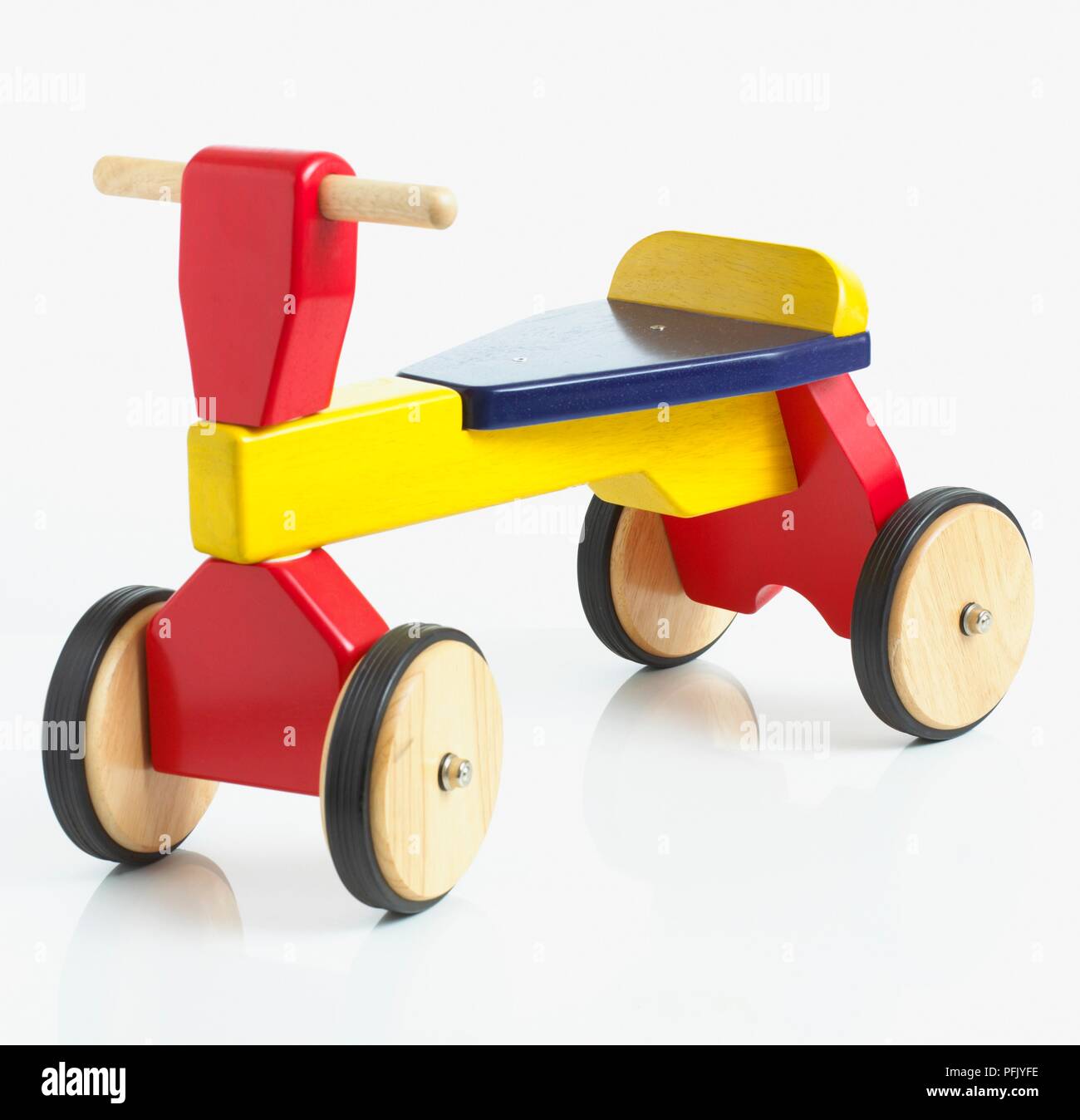 Wooden quadricycle toy Stock Photo - Alamy