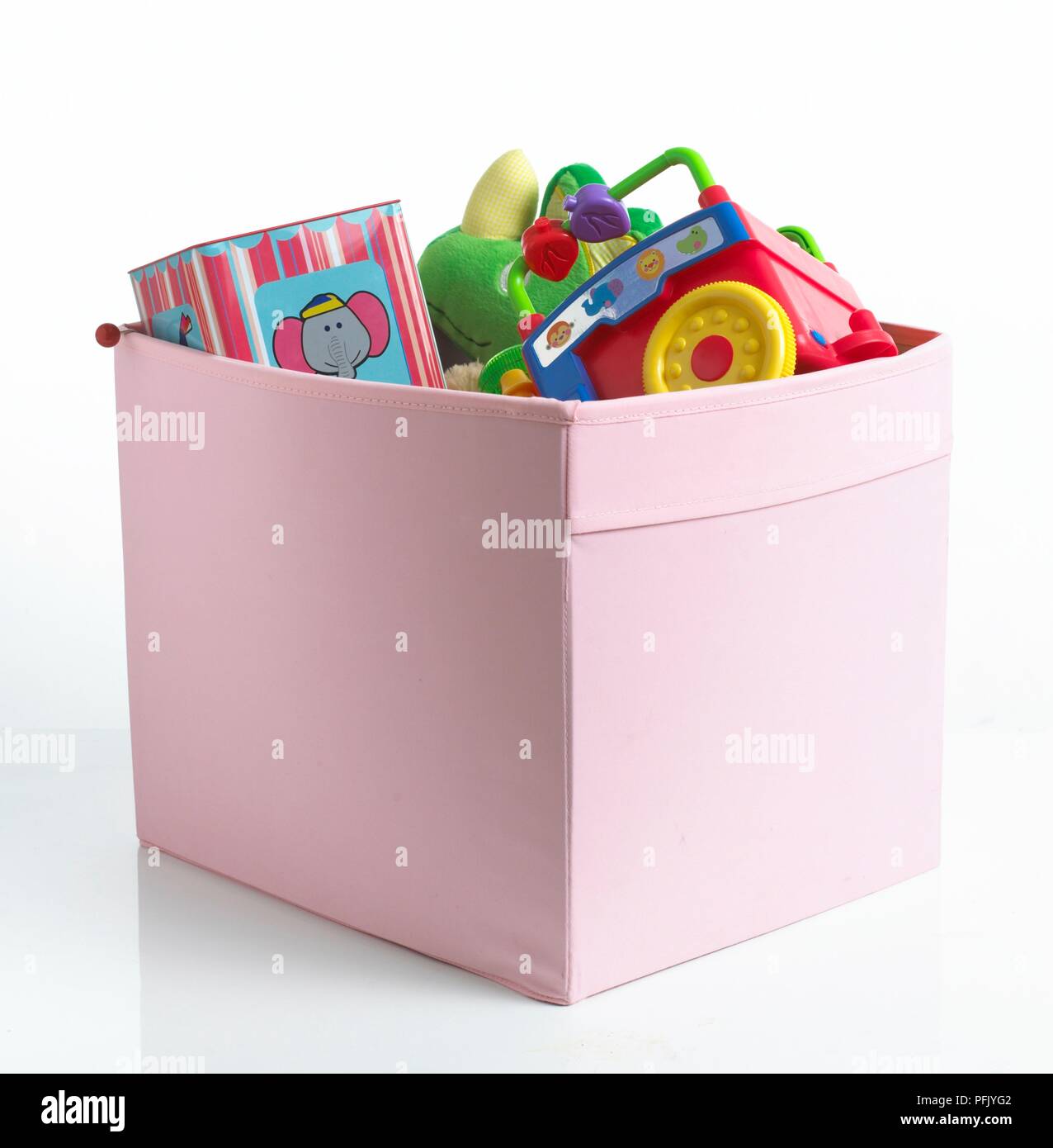 Pink box full of toys Stock Photo - Alamy