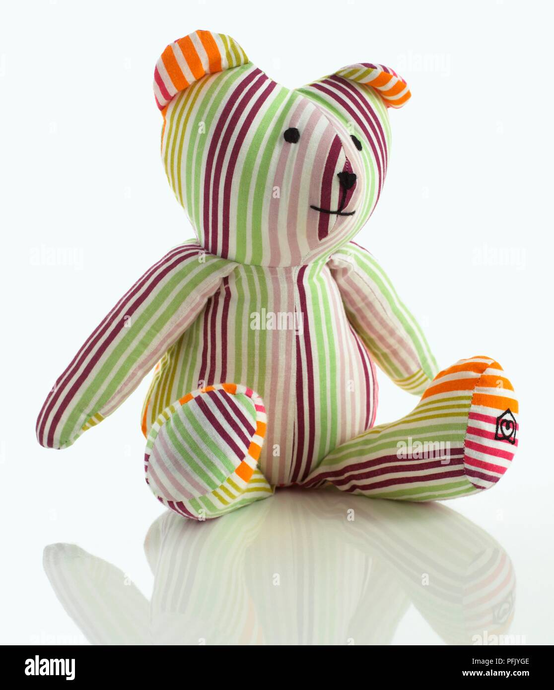 Multi coloured teddy bear hi-res stock photography and images - Alamy
