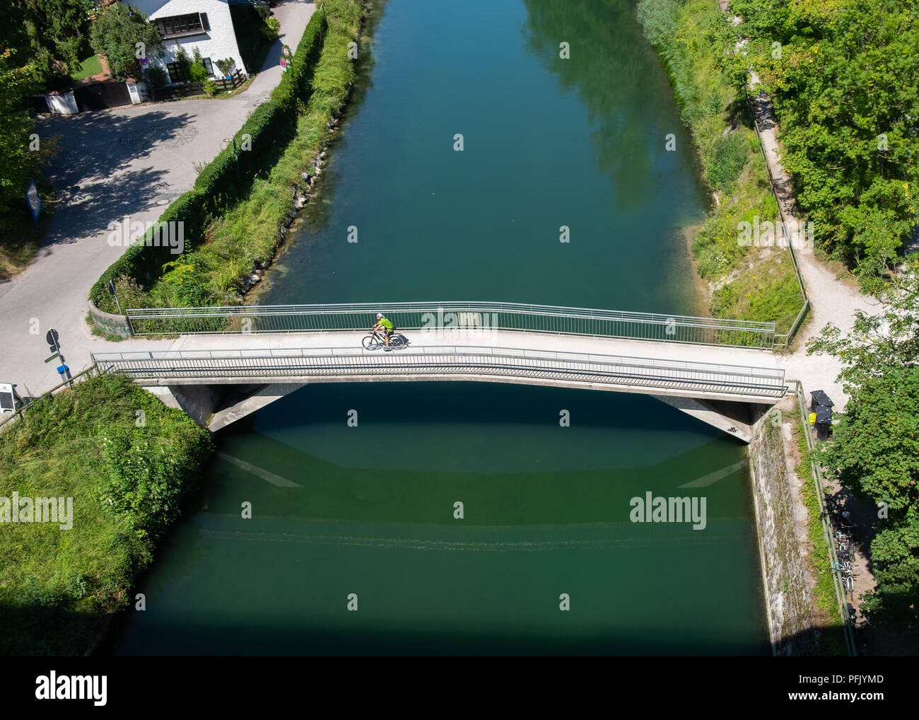 Looking down onto pedestrian bridge over Isar river canal from ...