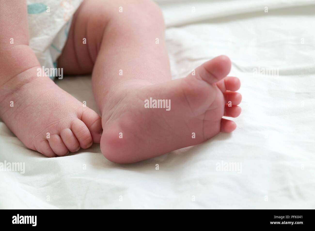 Baby's feet, close-up Stock Photo - Alamy