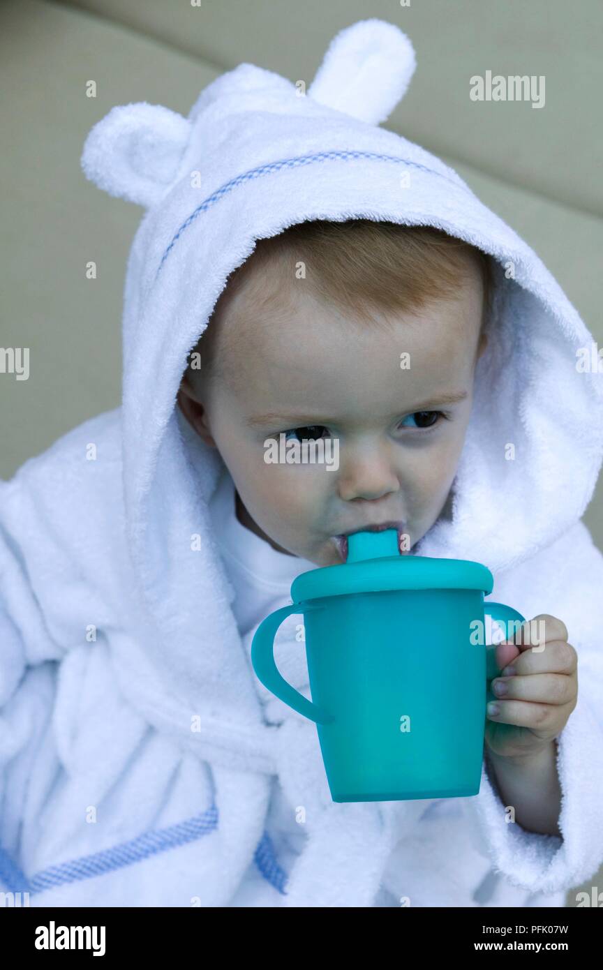Boy drinking from plastic cup hi-res stock photography and images - Alamy