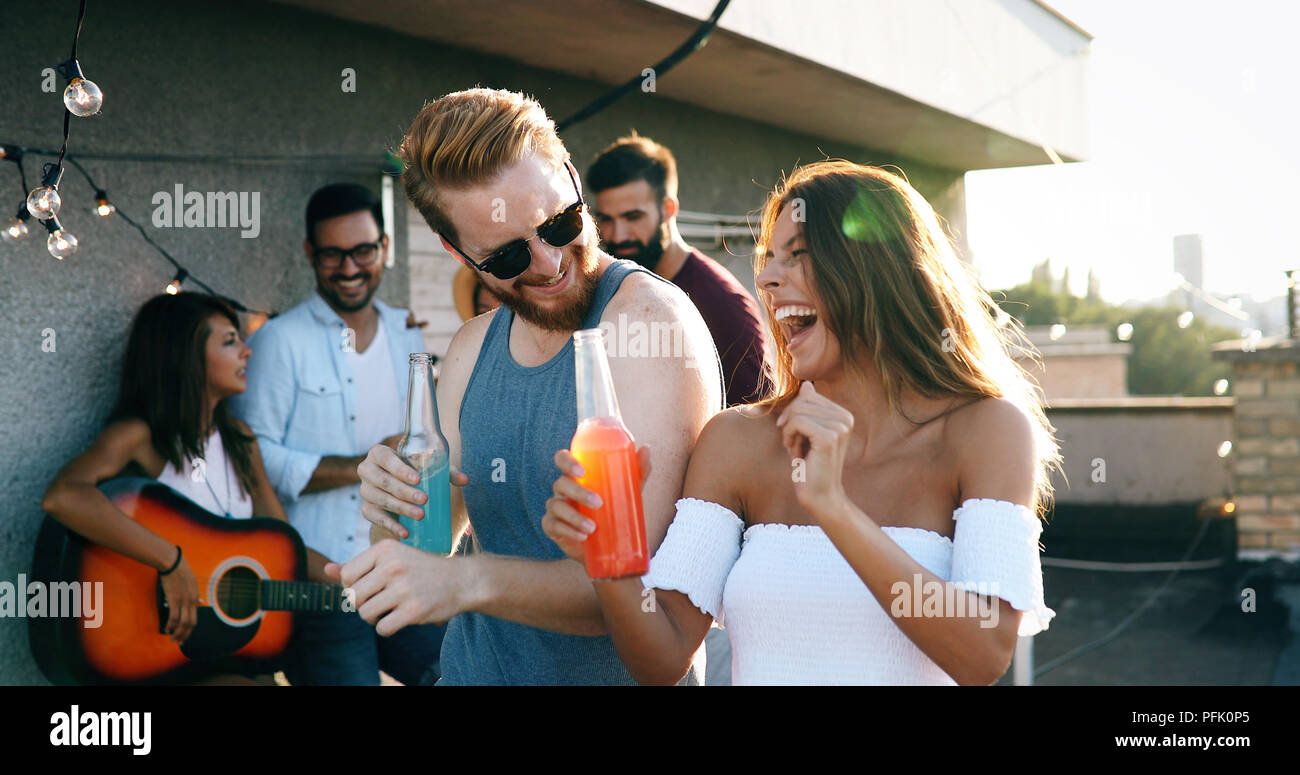 Happy friends laughing and smiling outdoors Stock Photo - Alamy