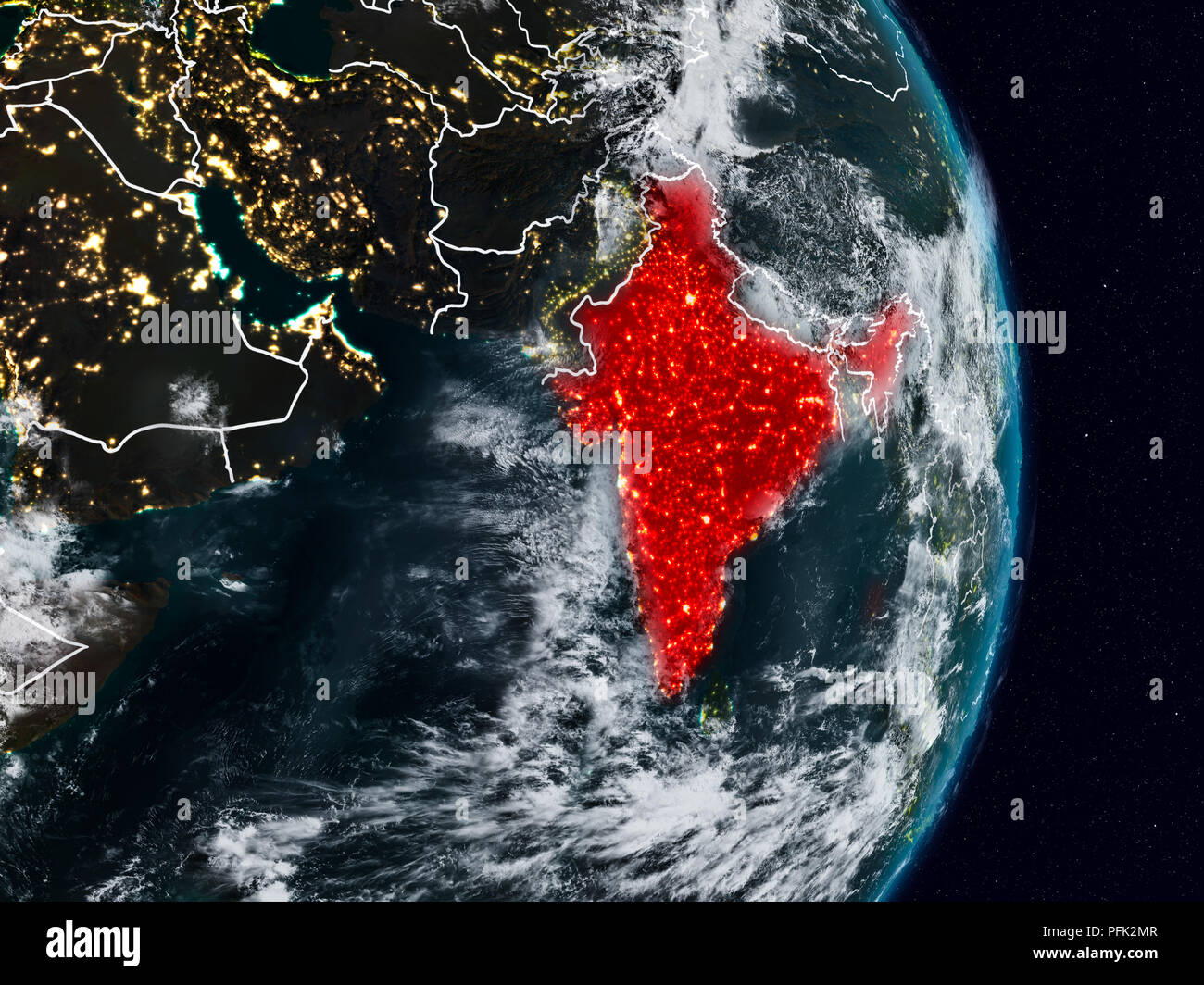 India from space on planet Earth at night with visible country borders ...