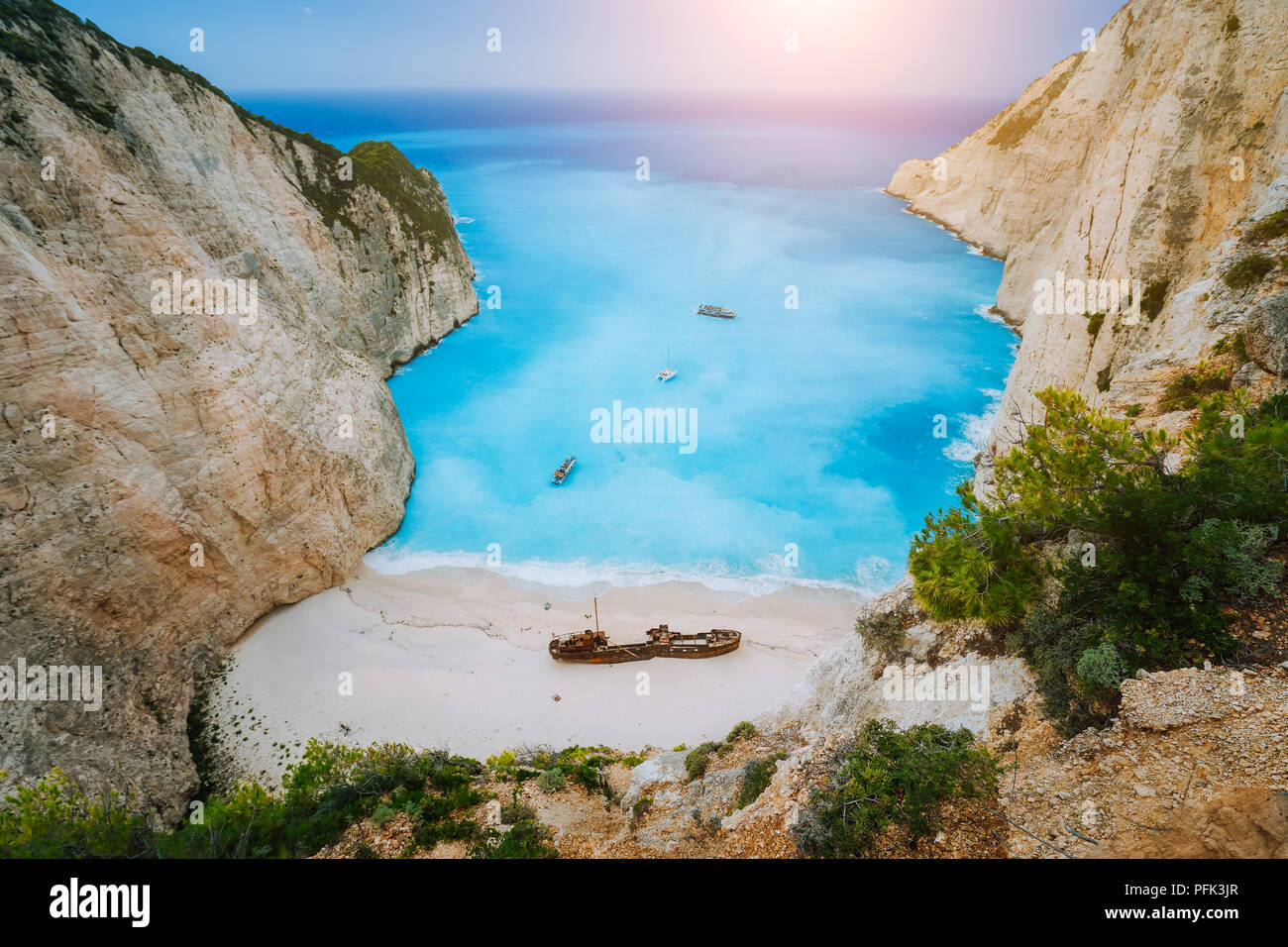 Breathtaking view of Shipwreck middle of sandy Navagio beach surrounded ...