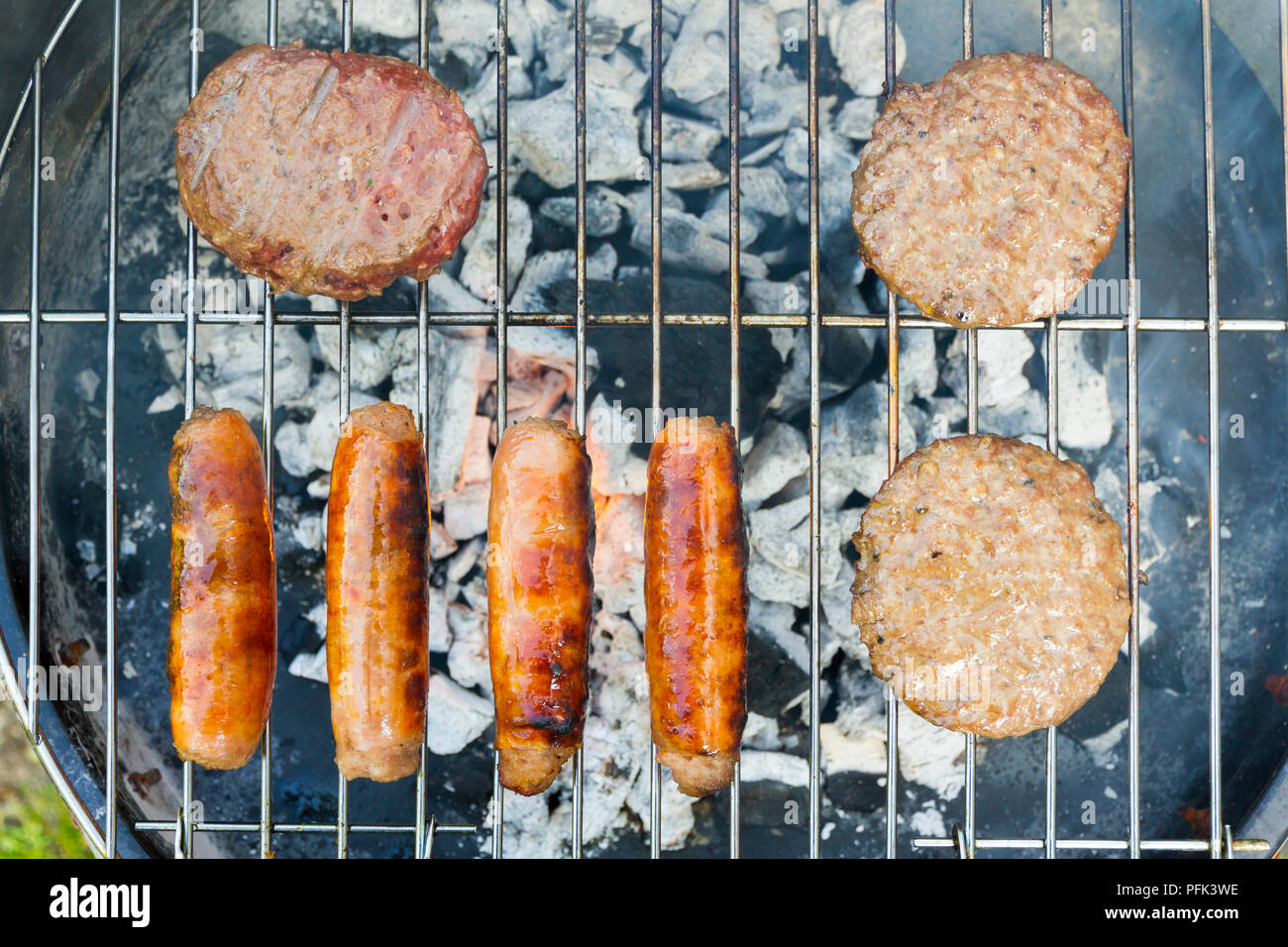 Food cooking on a barbecue grill Stock Photo - Alamy