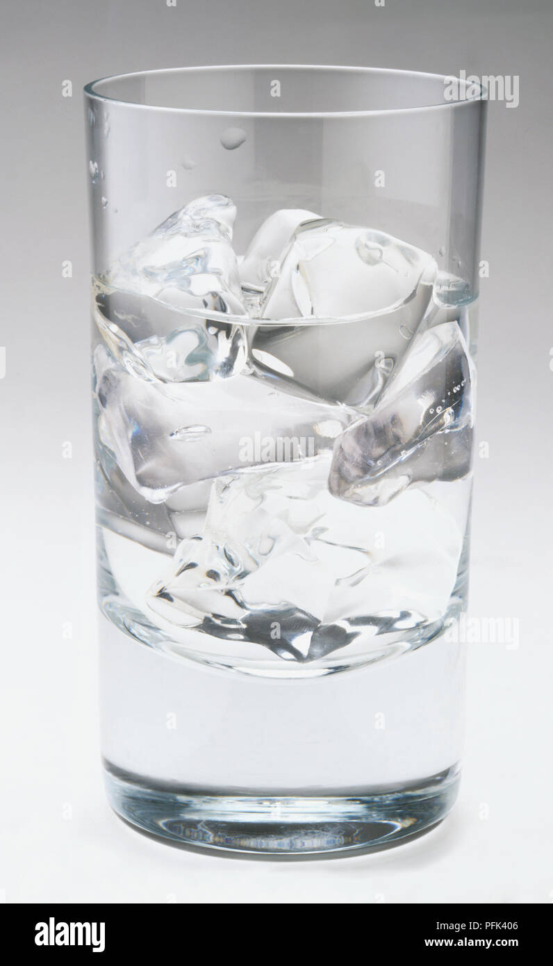 Glass filled with ice cubes Stock Photo - Alamy