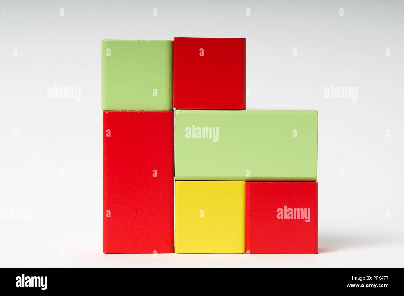 Stack of colourful wooden building blocks Stock Photo - Alamy
