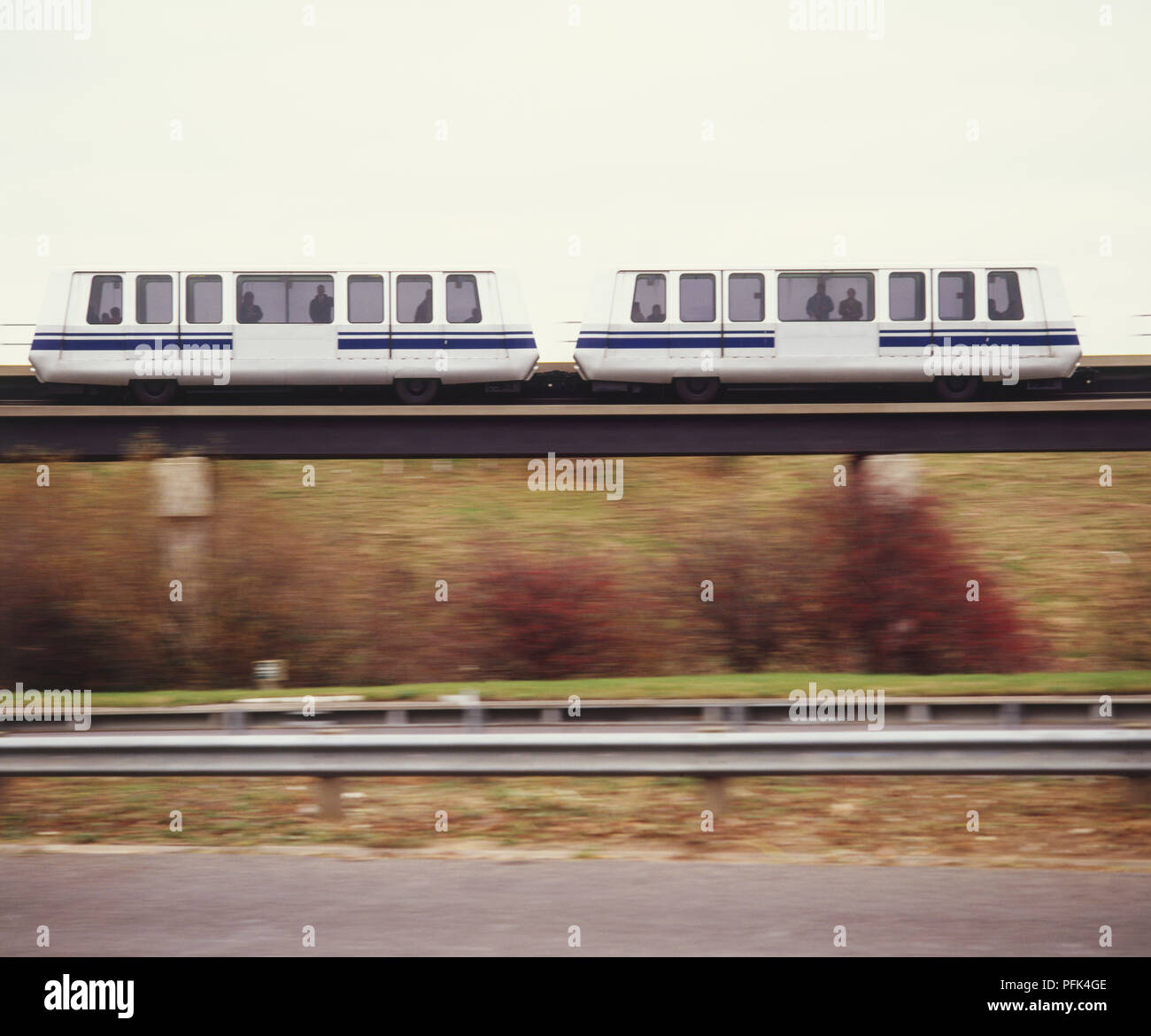 Monorail train on elevated railway track Stock Photo - Alamy
