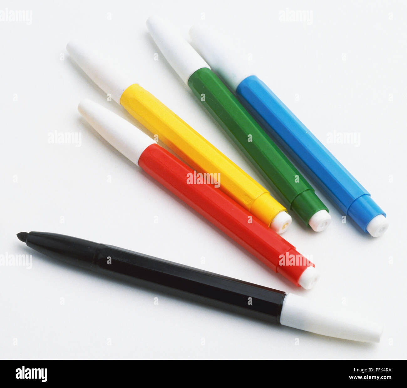Different coloured felt-tip pens, blue, green, yellow, red and black ...