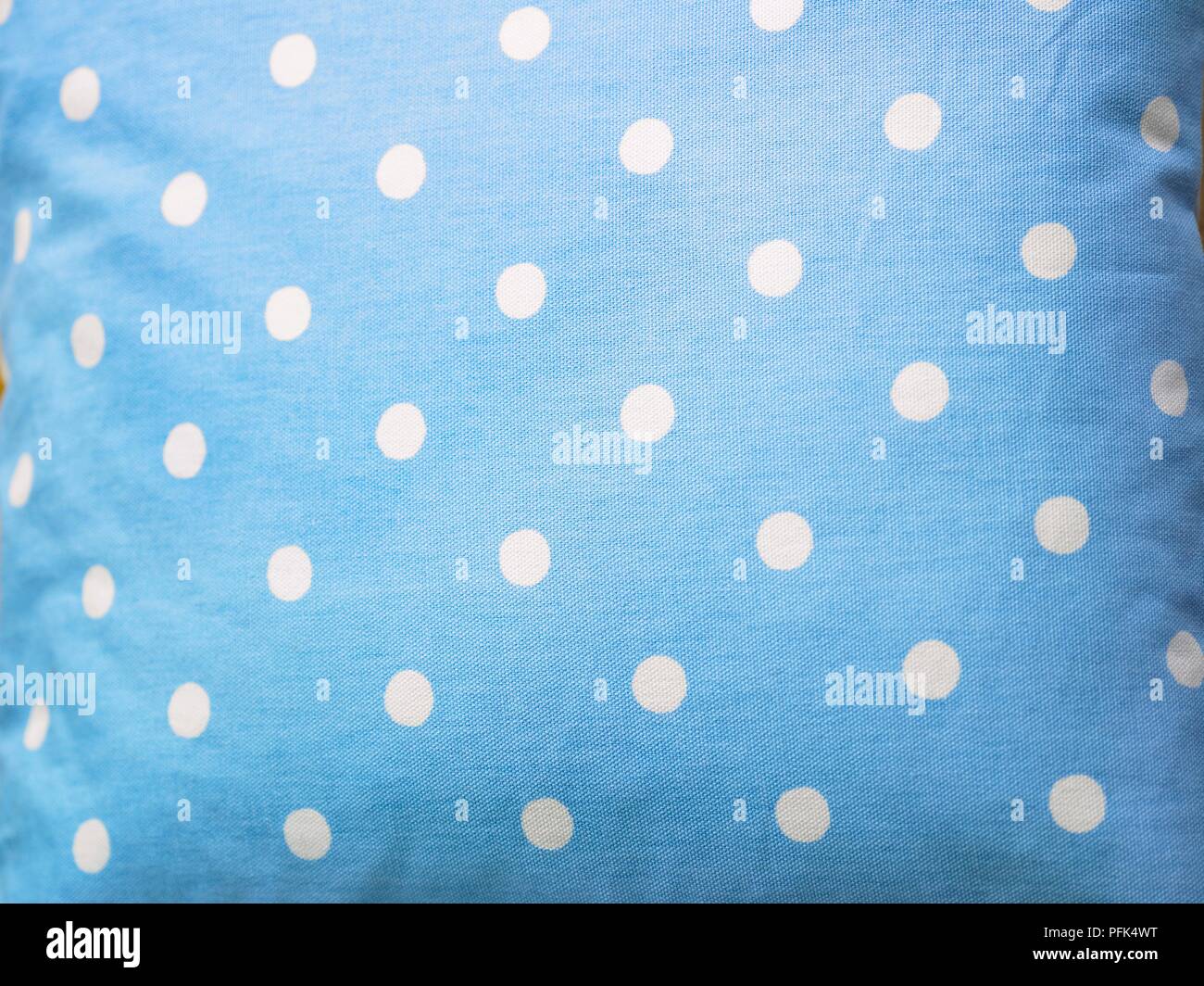 Blue and white spotted bedding fabric, close-up Stock Photo - Alamy