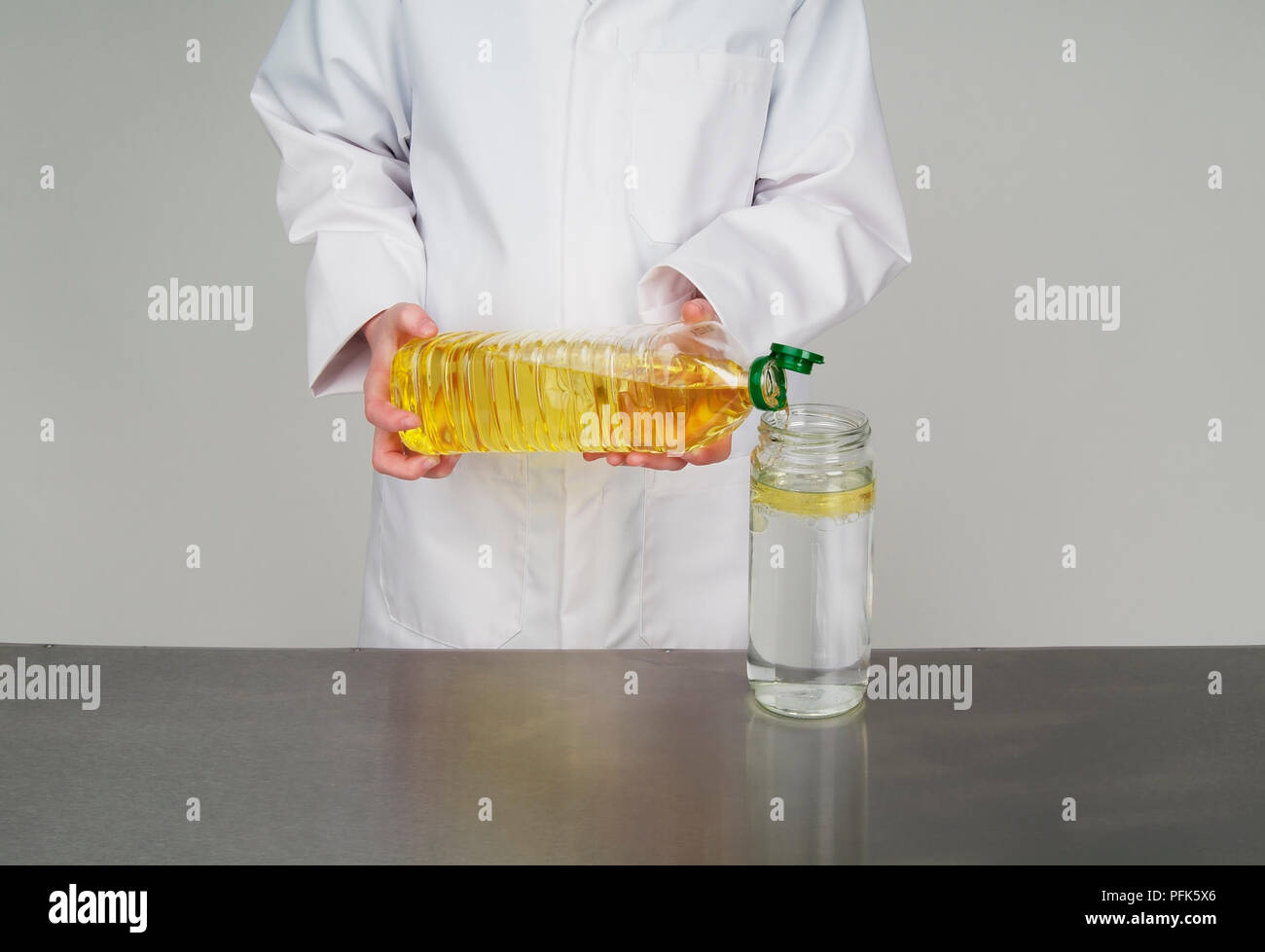 Pouring oil in water hi-res stock photography and images - Alamy