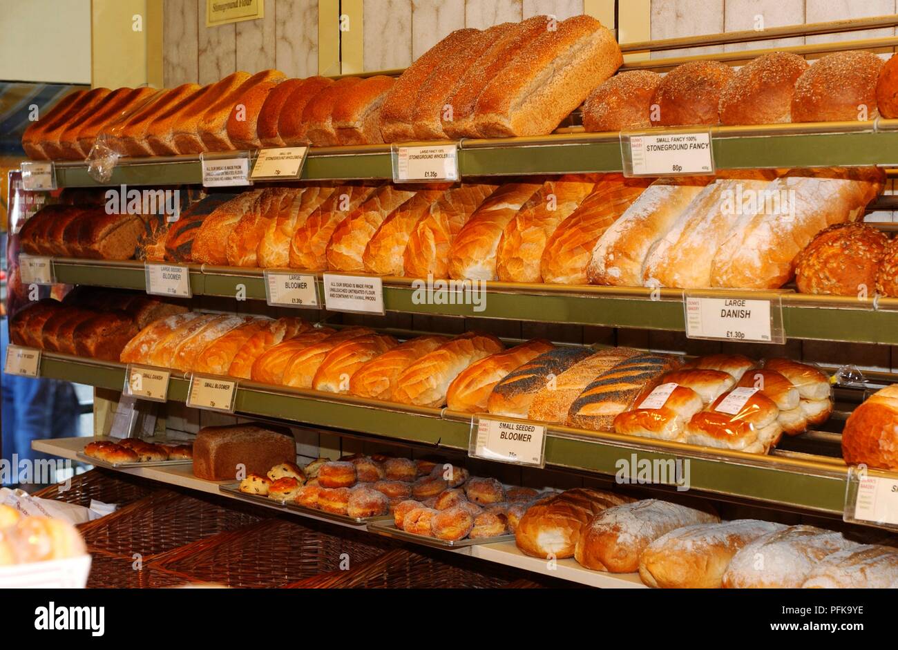Variety of bread on display in a bakery Stock Photo - Alamy