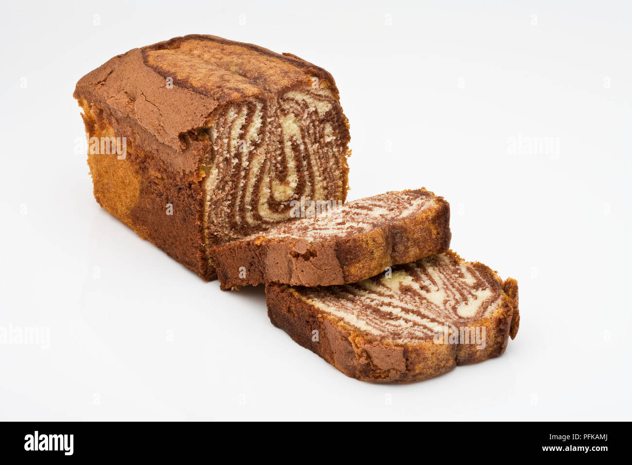 Marble cake with two slices cut away Stock Photo - Alamy