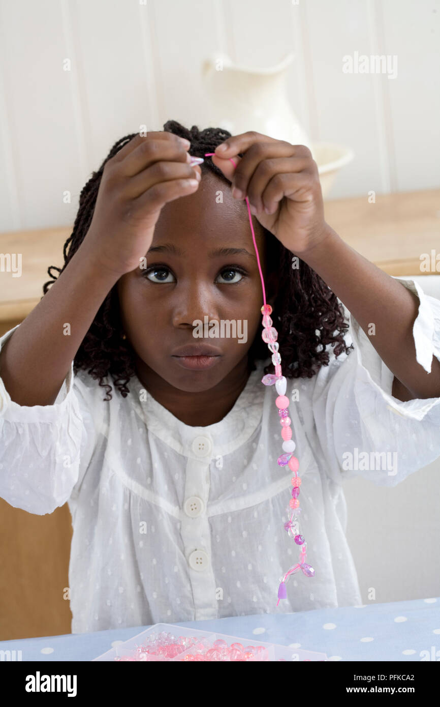 Threading beads hi-res stock photography and images - Alamy