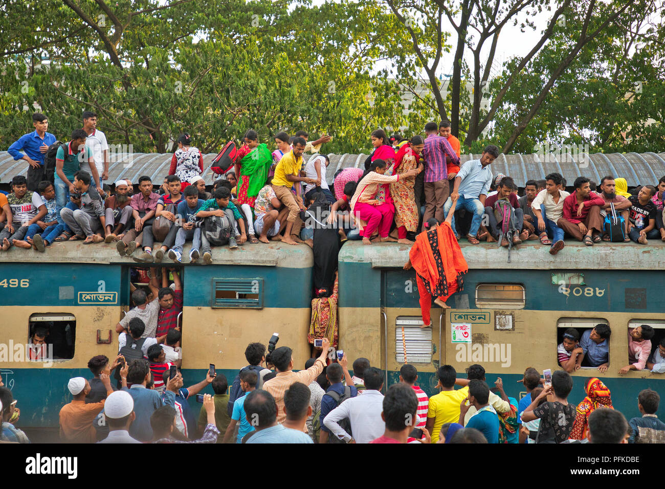 Journey by train with life risk Stock Photo - Alamy
