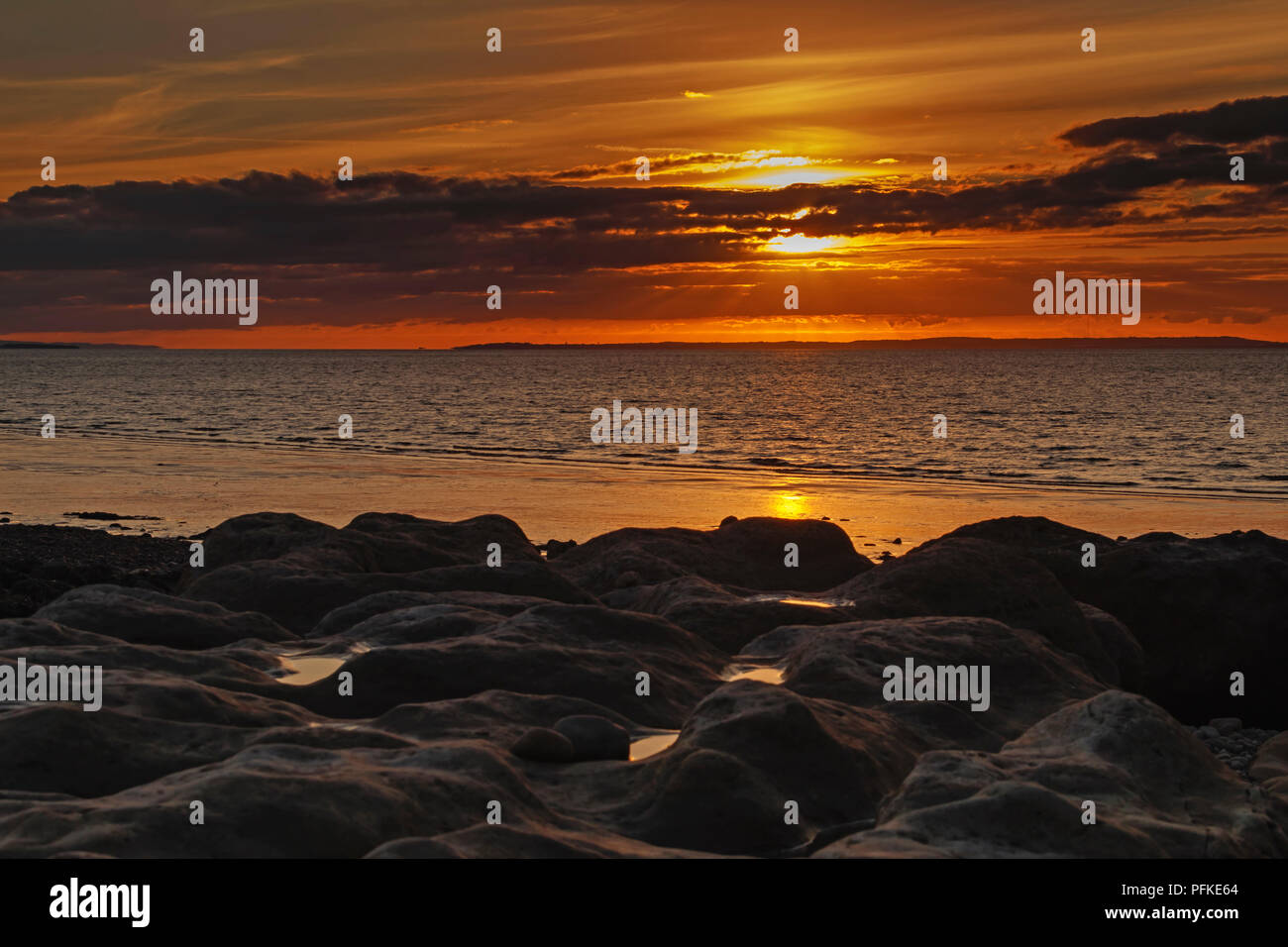 The setting sun Stock Photo - Alamy
