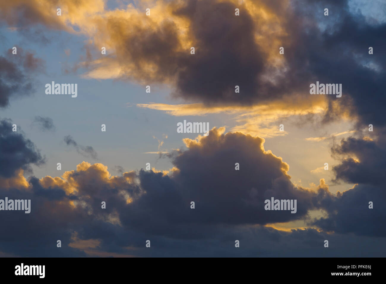 Cloud formation with silver lining Stock Photo - Alamy