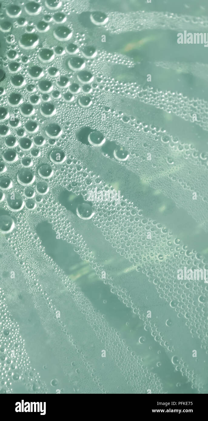 Water drops at gradient background. Glass covered with water drops ...