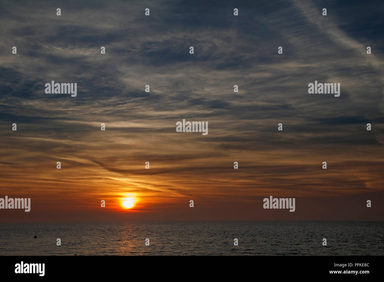 Wispy clouds and intense sun hi-res stock photography and images - Alamy