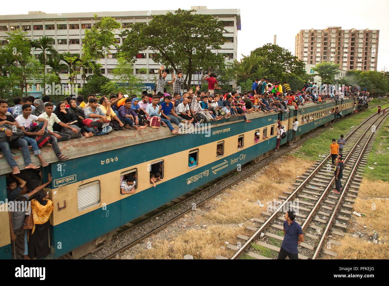 Journey by train with life risk Stock Photo - Alamy