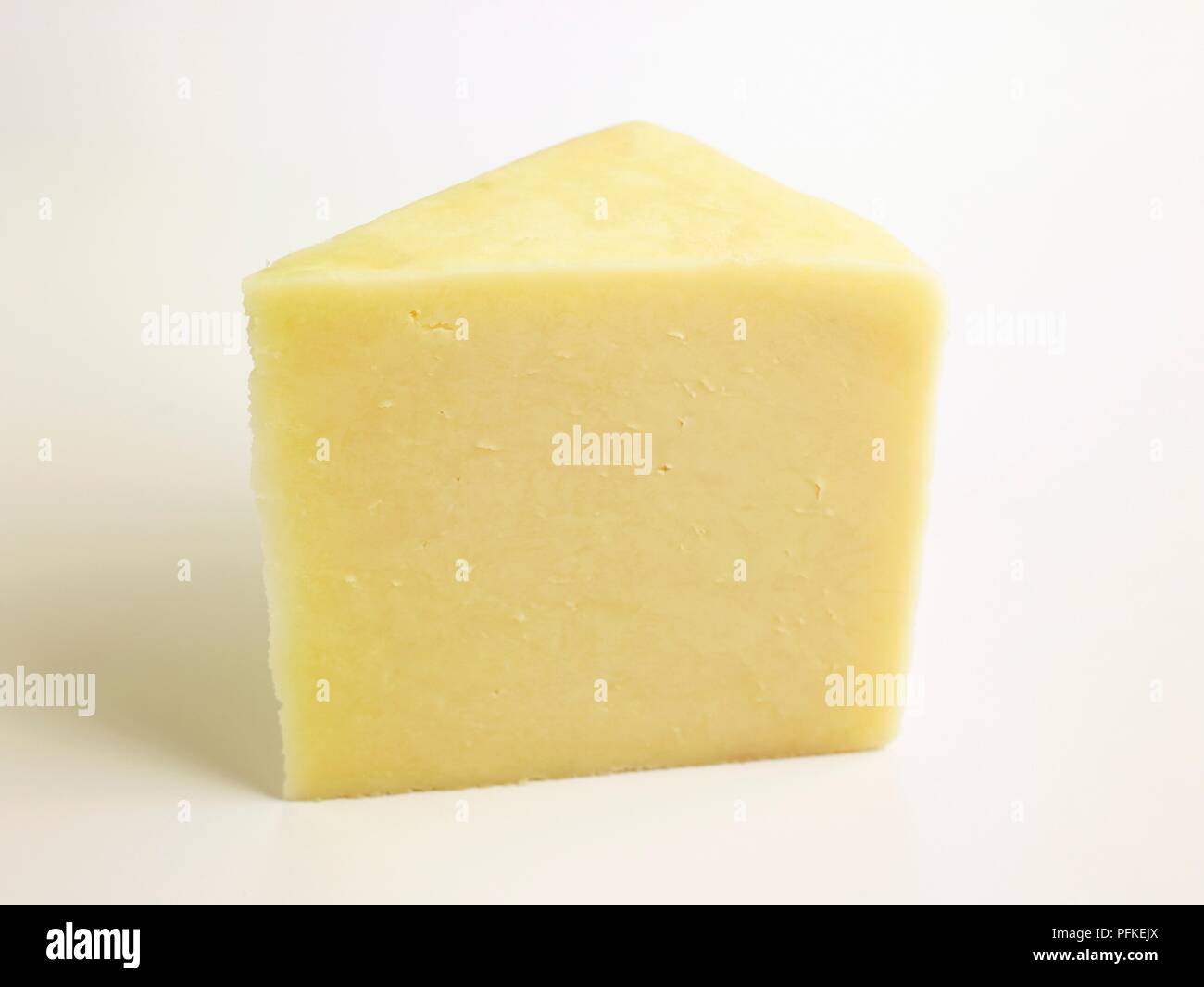 Slice of Welsh Talley Mountain Goat's Cheese Stock Photo - Alamy