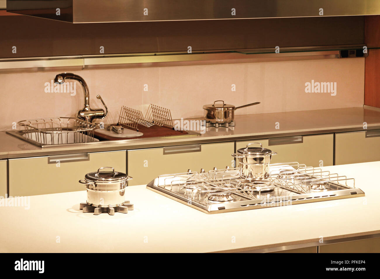 Modern kitchen counter with gas burning stove Stock Photo - Alamy