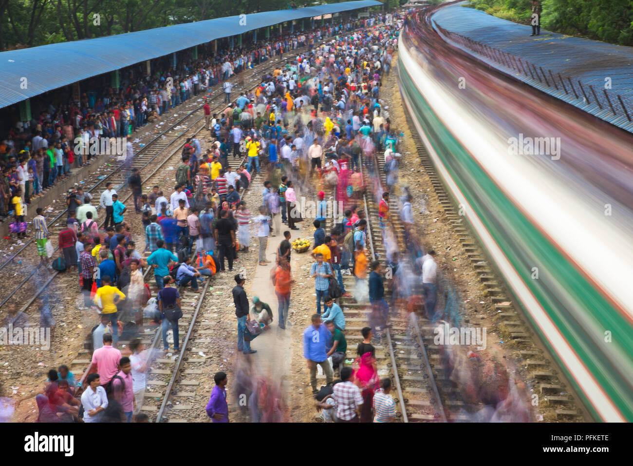 Journey by train with life risk Stock Photo - Alamy