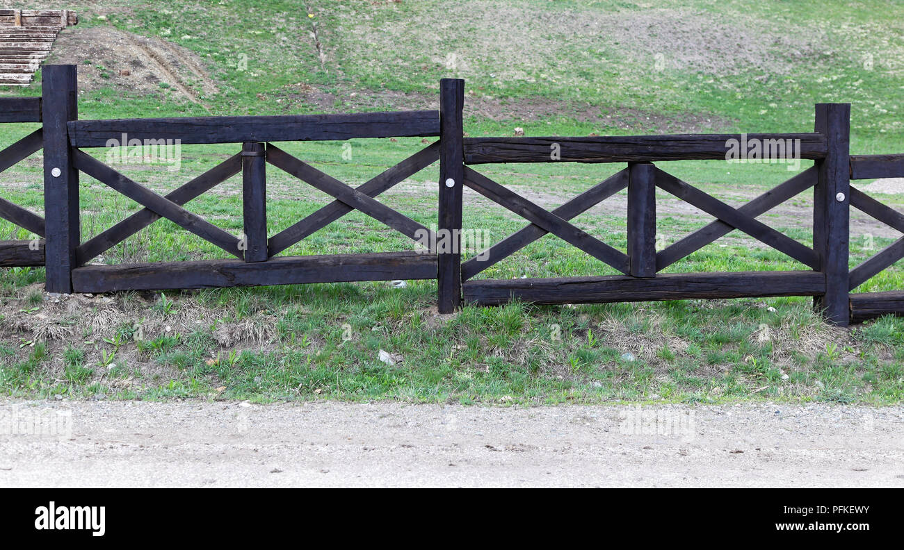 Black wood fence hi-res stock photography and images - Alamy