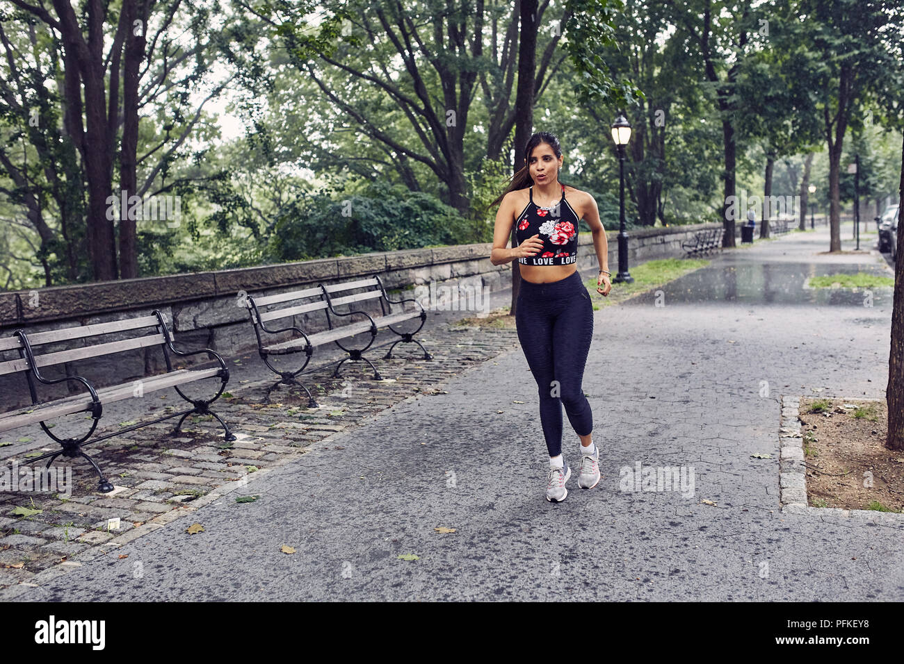 Latina Hispanic Woman Running Jogging Stock Photo - Alamy