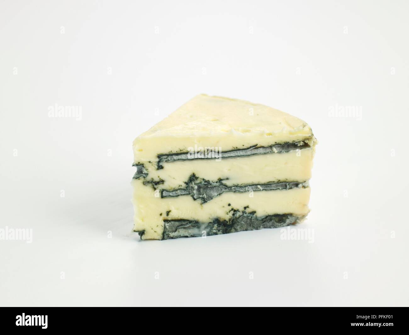 Slice of Danish Bla Castello cow's milk blue cheese Stock Photo - Alamy