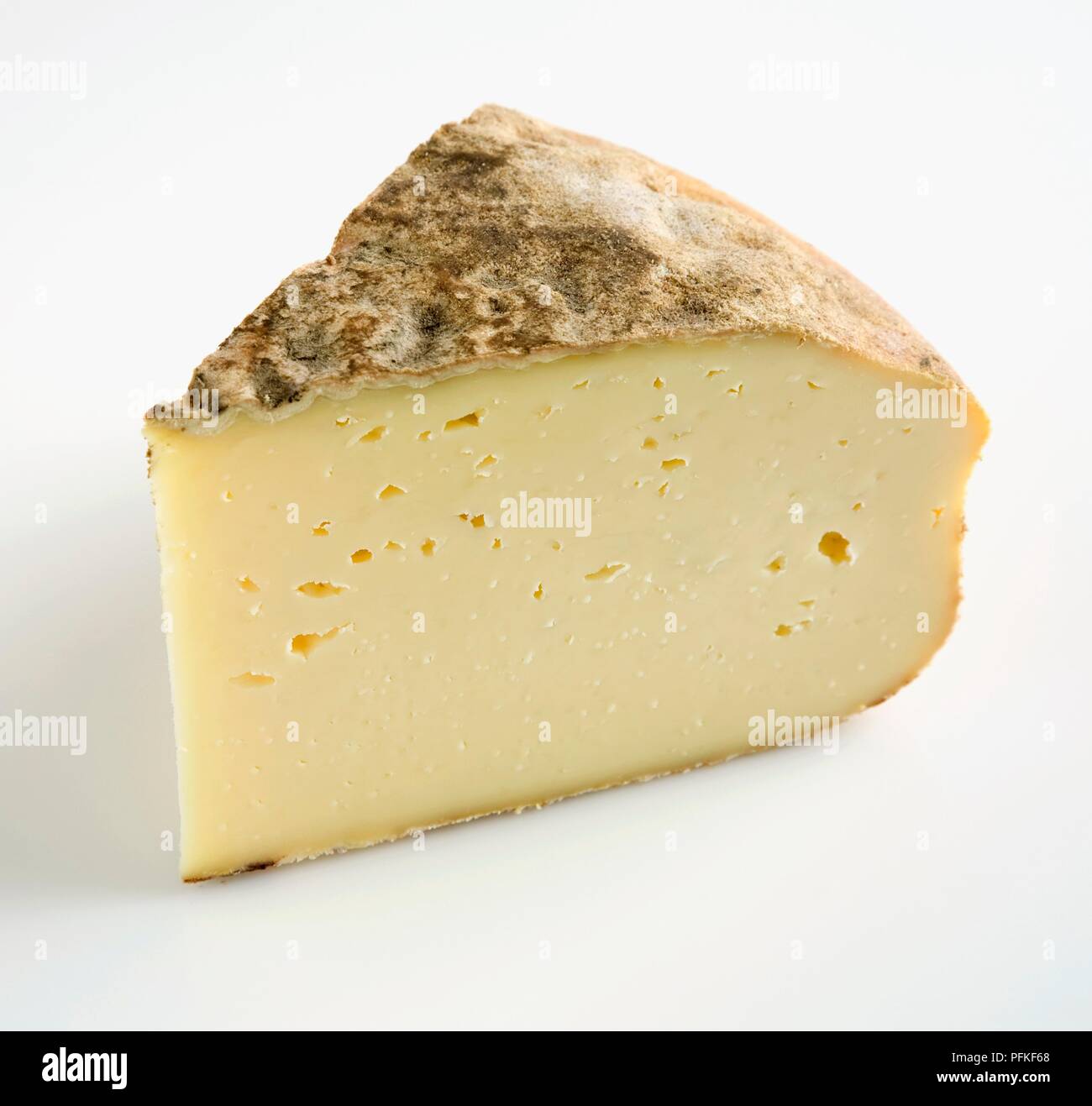 Slice of American Brigid's Abbey cow's milk cheese Stock Photo - Alamy