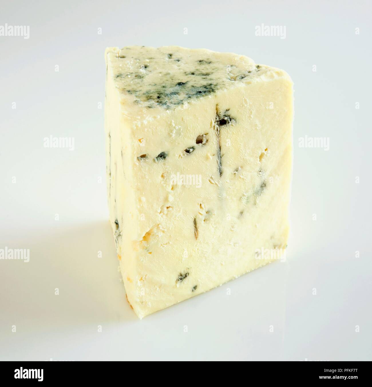 Slice of American Great Hill Blue cow's milk cheese Stock Photo - Alamy