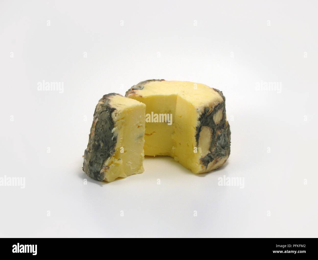 Canadian Baby Blue cow's milk cheese with a slice cut away Stock Photo ...