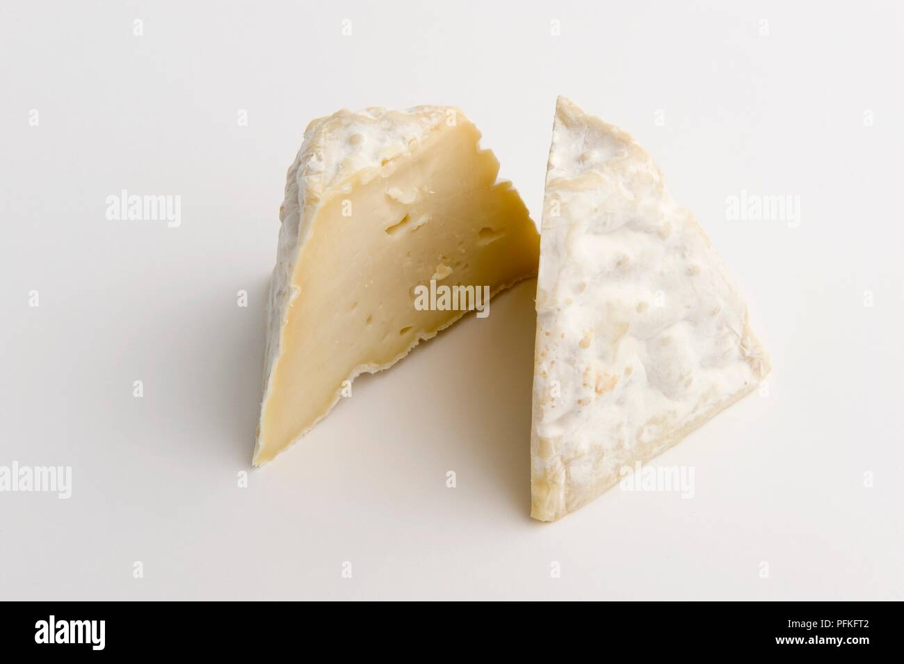 Sliced New Zealand Kapiti Mount Hector goat's cheese Stock Photo - Alamy