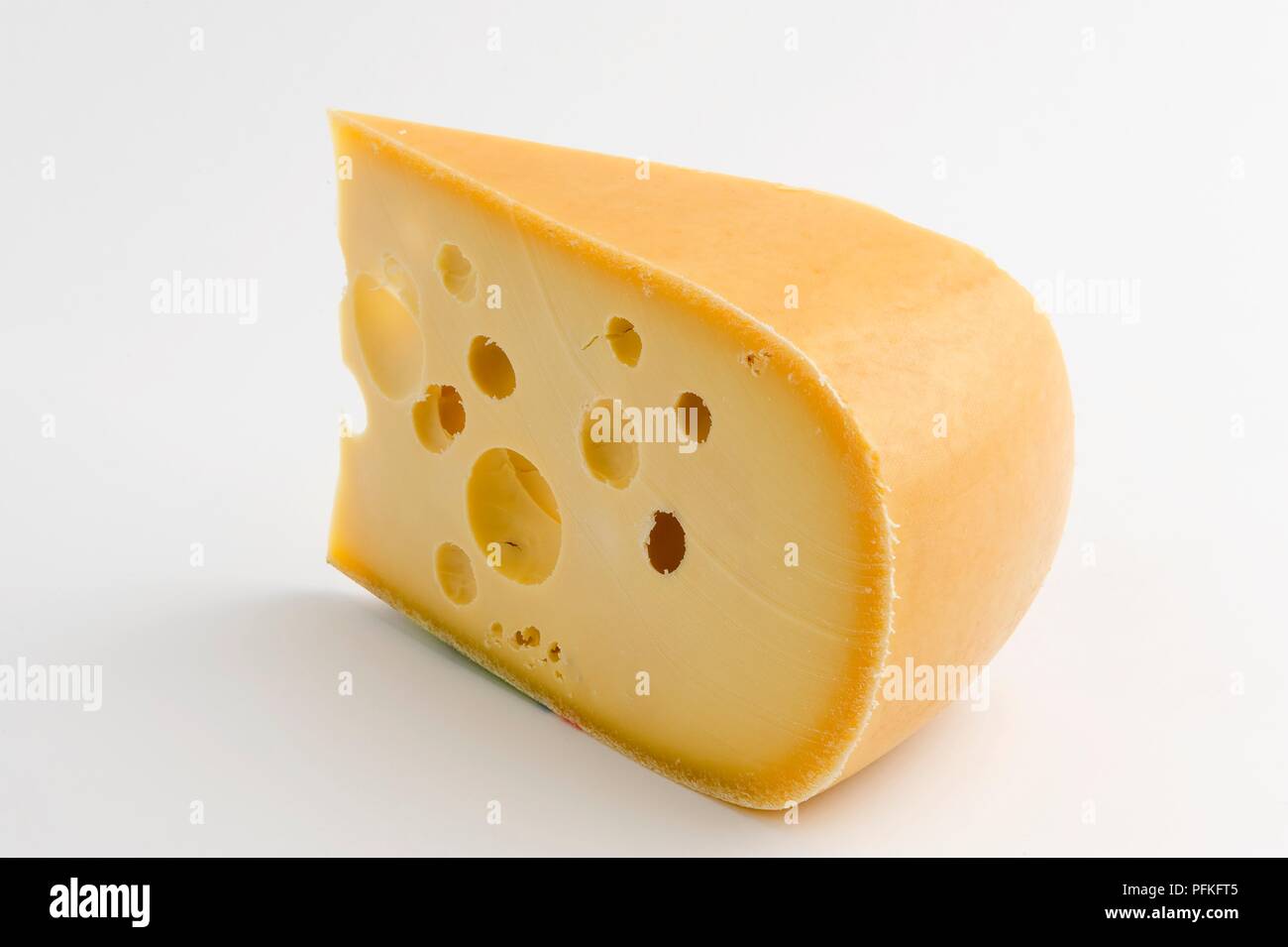 Slice of New Zealand Mercer Maasdam cow's milk cheese Stock Photo - Alamy
