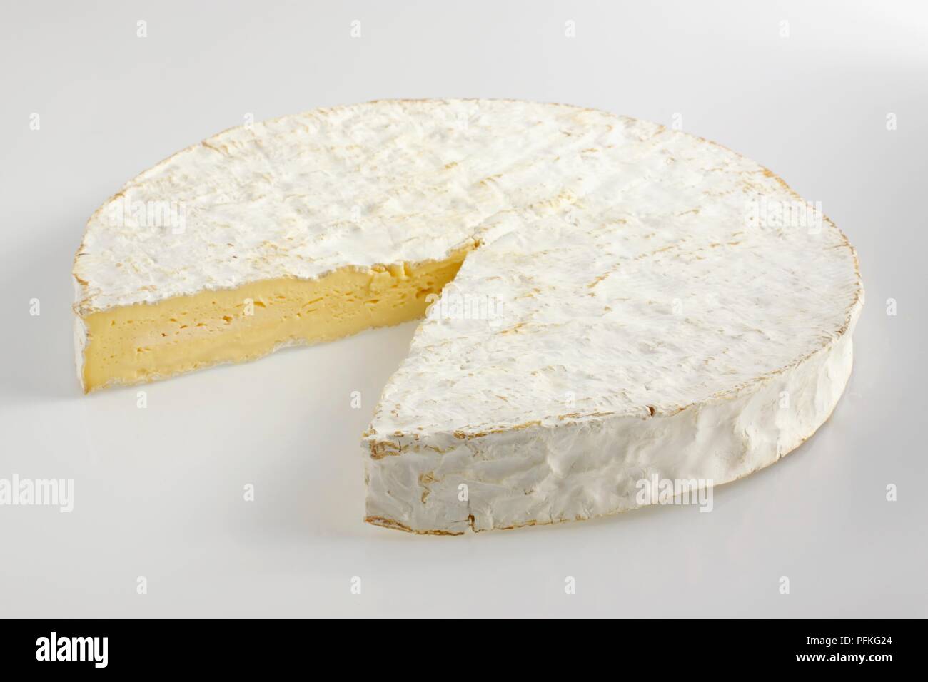 Wheel of French Brie de Meaux AOC cow's milk cheese Stock Photo - Alamy
