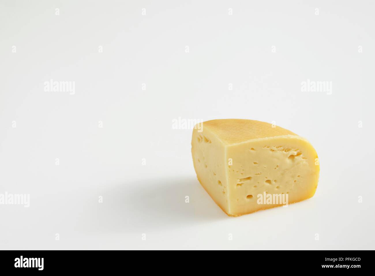 Slice of French Cure Nantais cow's milk cheese Stock Photo - Alamy